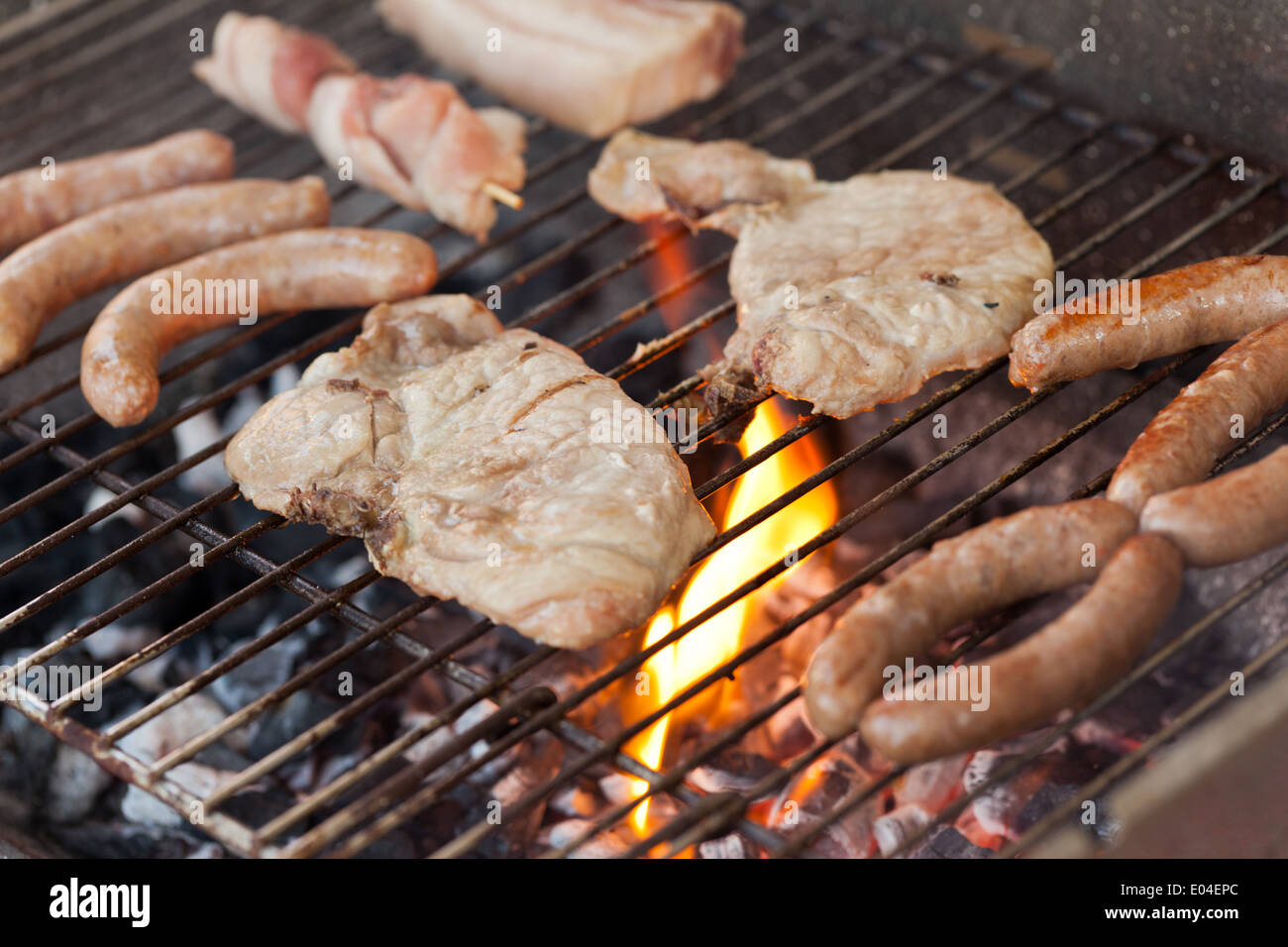 Cooking several meats hi-res stock photography and images - Alamy