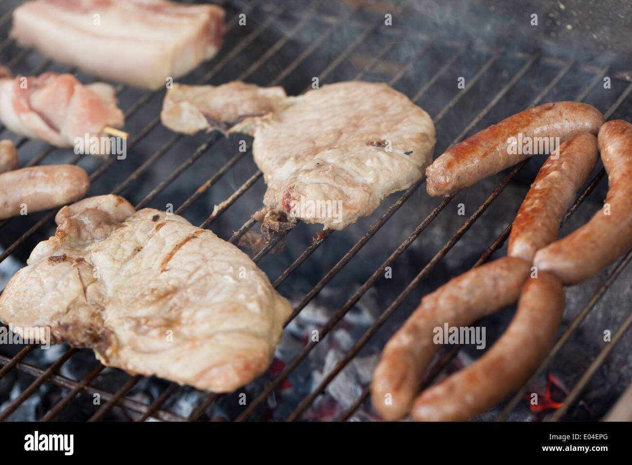 Cooking several meats hi-res stock photography and images - Alamy
