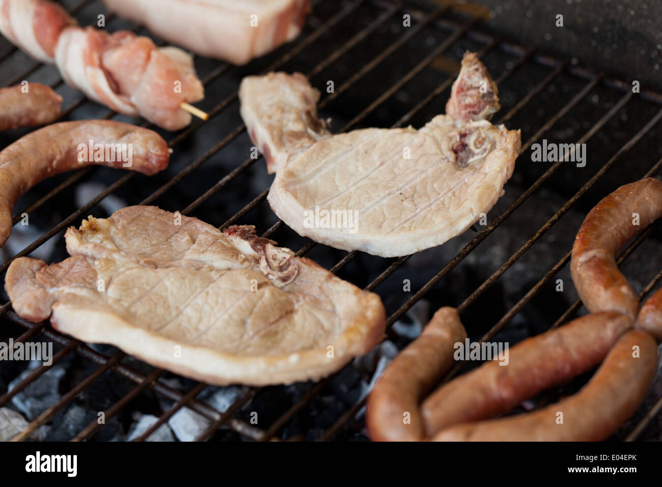 Cooking several meats hi-res stock photography and images - Alamy
