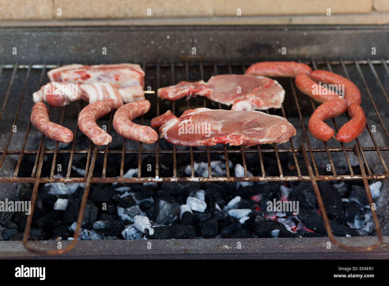 Cooking several meats hi-res stock photography and images - Alamy