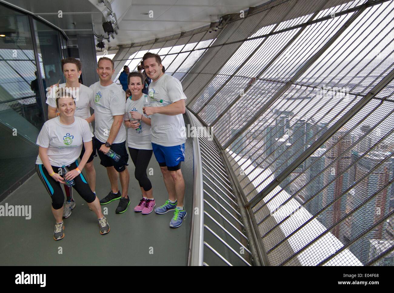 Toronto, Canada. 1st May, 2014. Participants pose for photos on top of ...