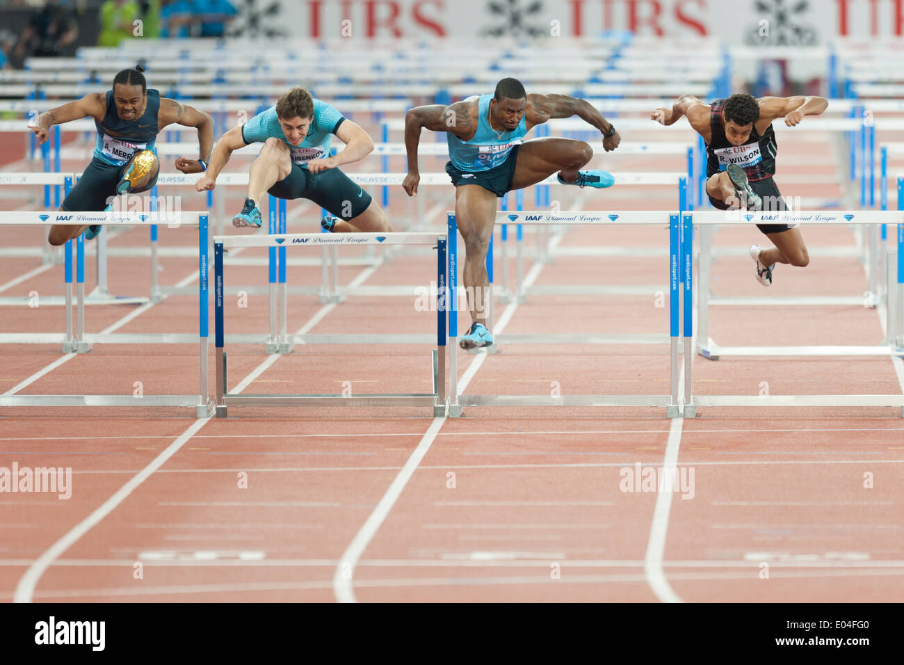 US athlete David Oliver on his way to victory at the 110m hurdles at ...