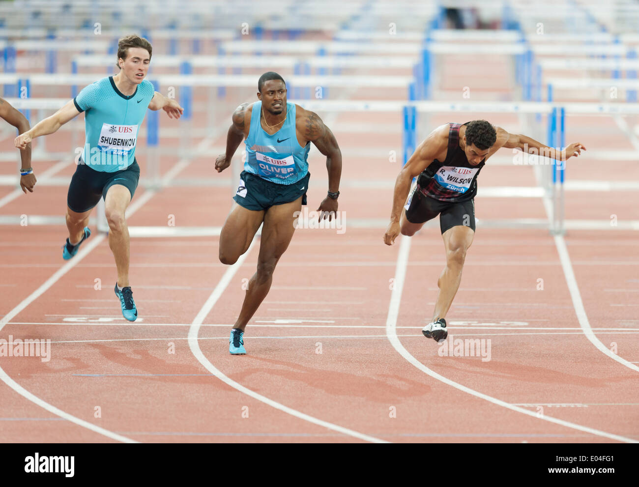 US athlete David Oliver on his way to victory at the 110m hurdles at ...