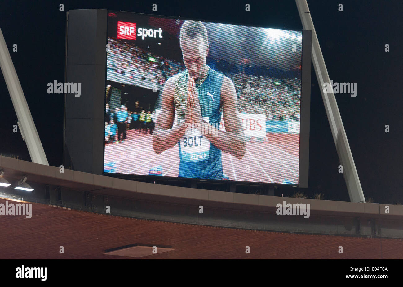 Usain Bolt on the big screen on top of Zurich's Letzigrund stadium ...