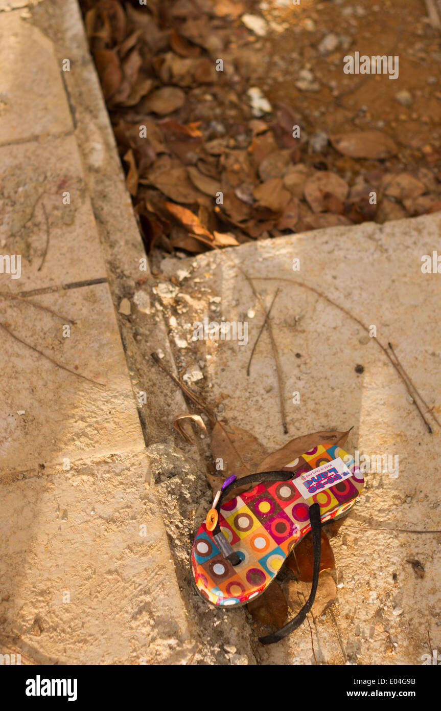 an broken slipper on a sunset Stock Photo - Alamy