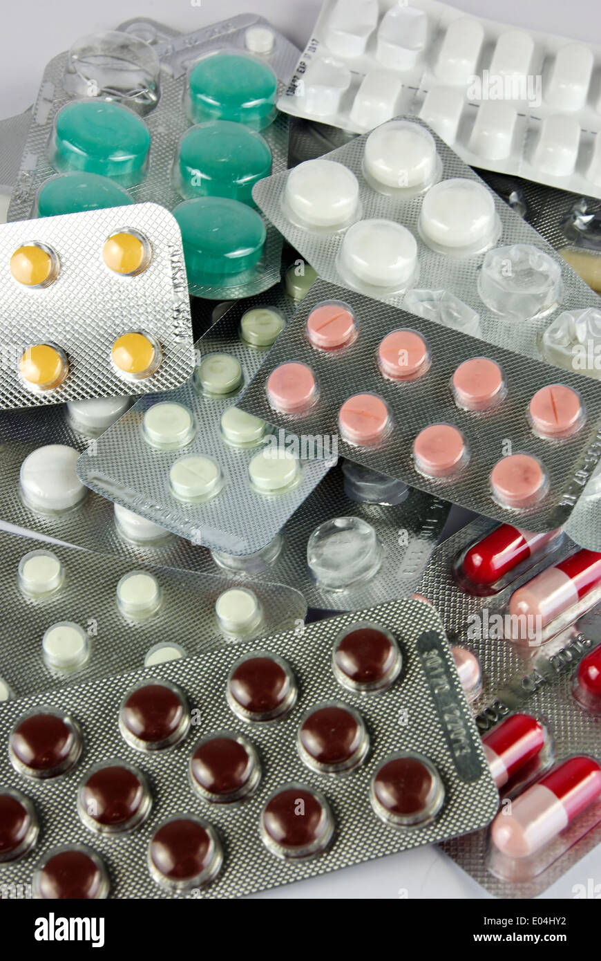 Pills, medicals, drugs, tablets in different colors, packed Stock Photo ...
