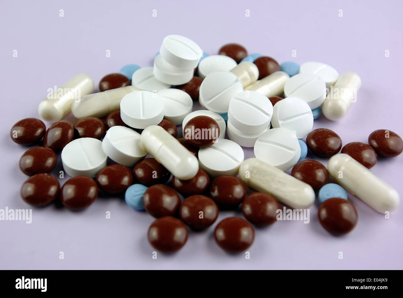 Pills, medicals, drugs, tablets in different colors, unpacked Stock ...