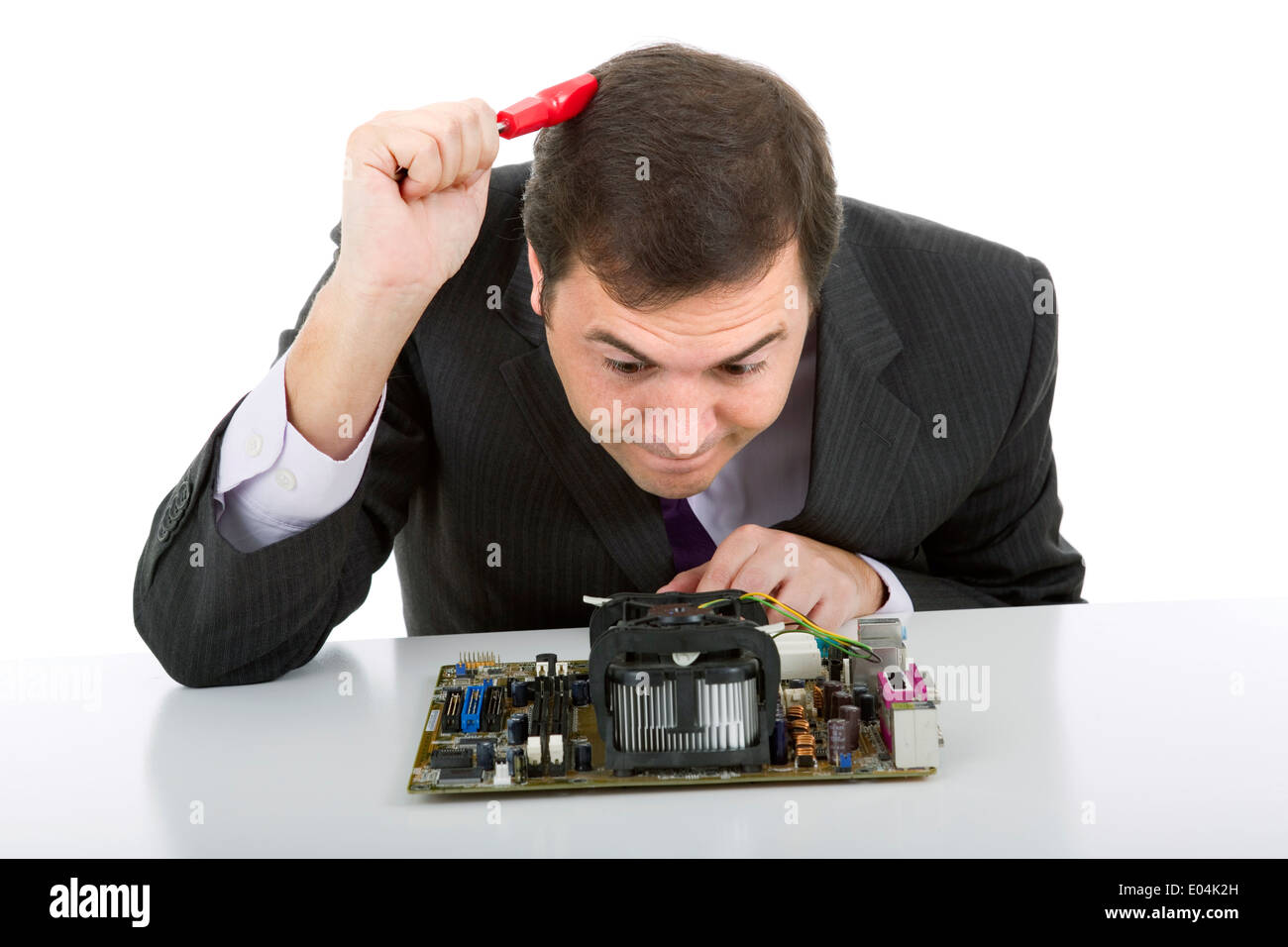 Computer Engineer working in a motherboard, isolated Stock Photo - Alamy