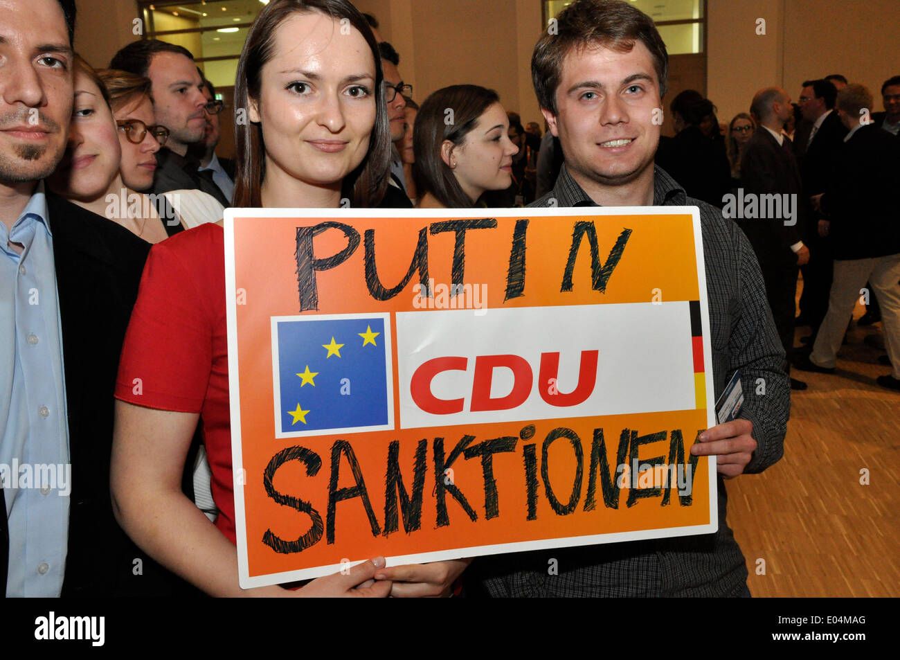 Frankfurt. 30th Apr, 2014. Young CDU party members hold a placard that ...