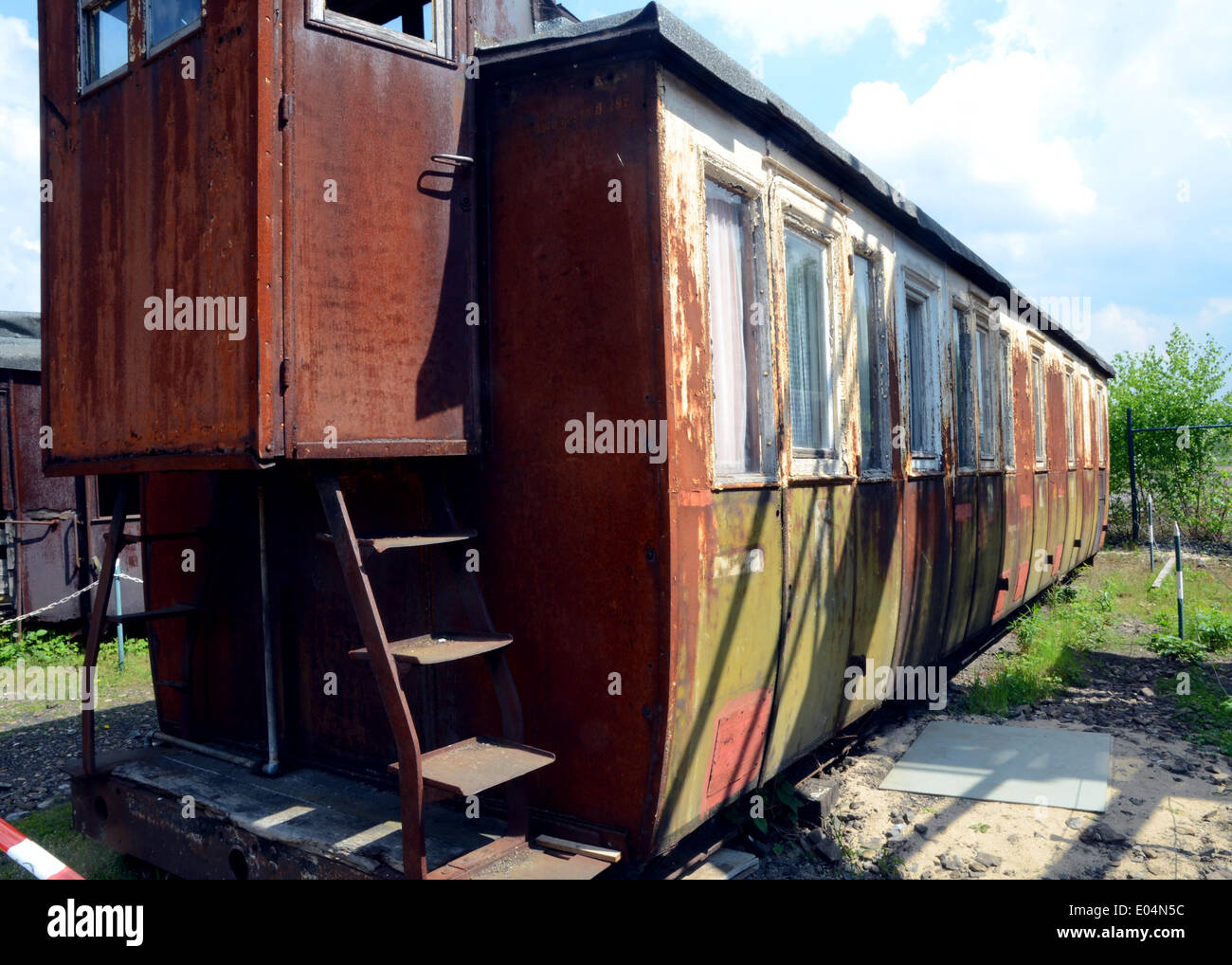 A rusted Prussian third class coach wagen from 1889 is on display at ...