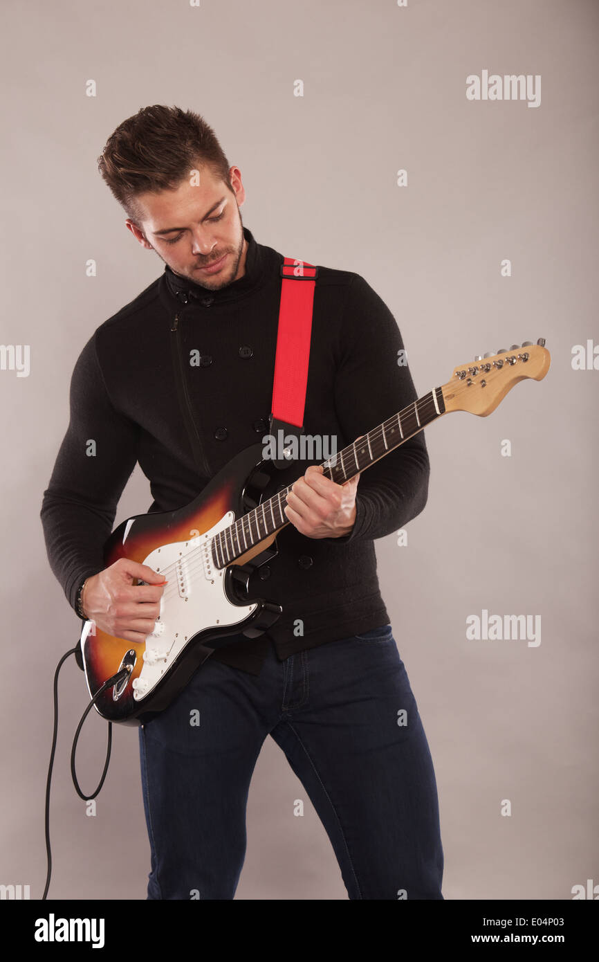Male guitar player hi-res stock photography and images - Alamy