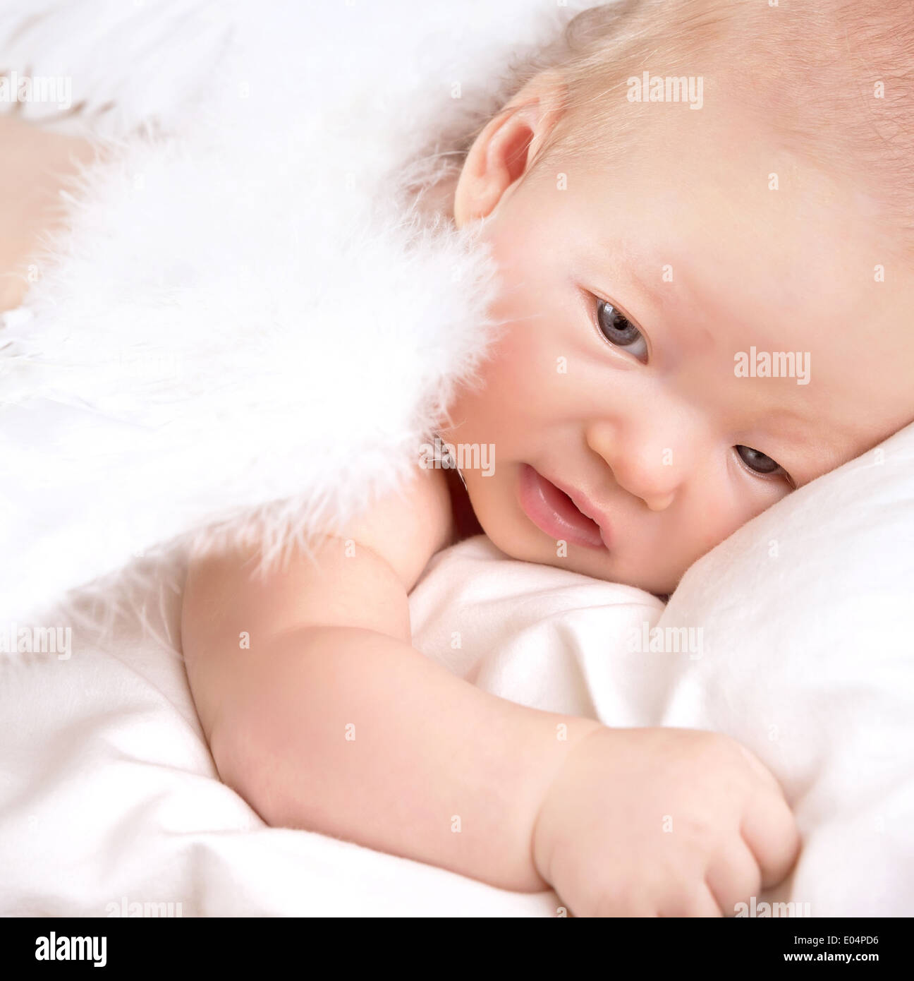 Closeup portrait of sweet angel baby, newborn child wearing white ...