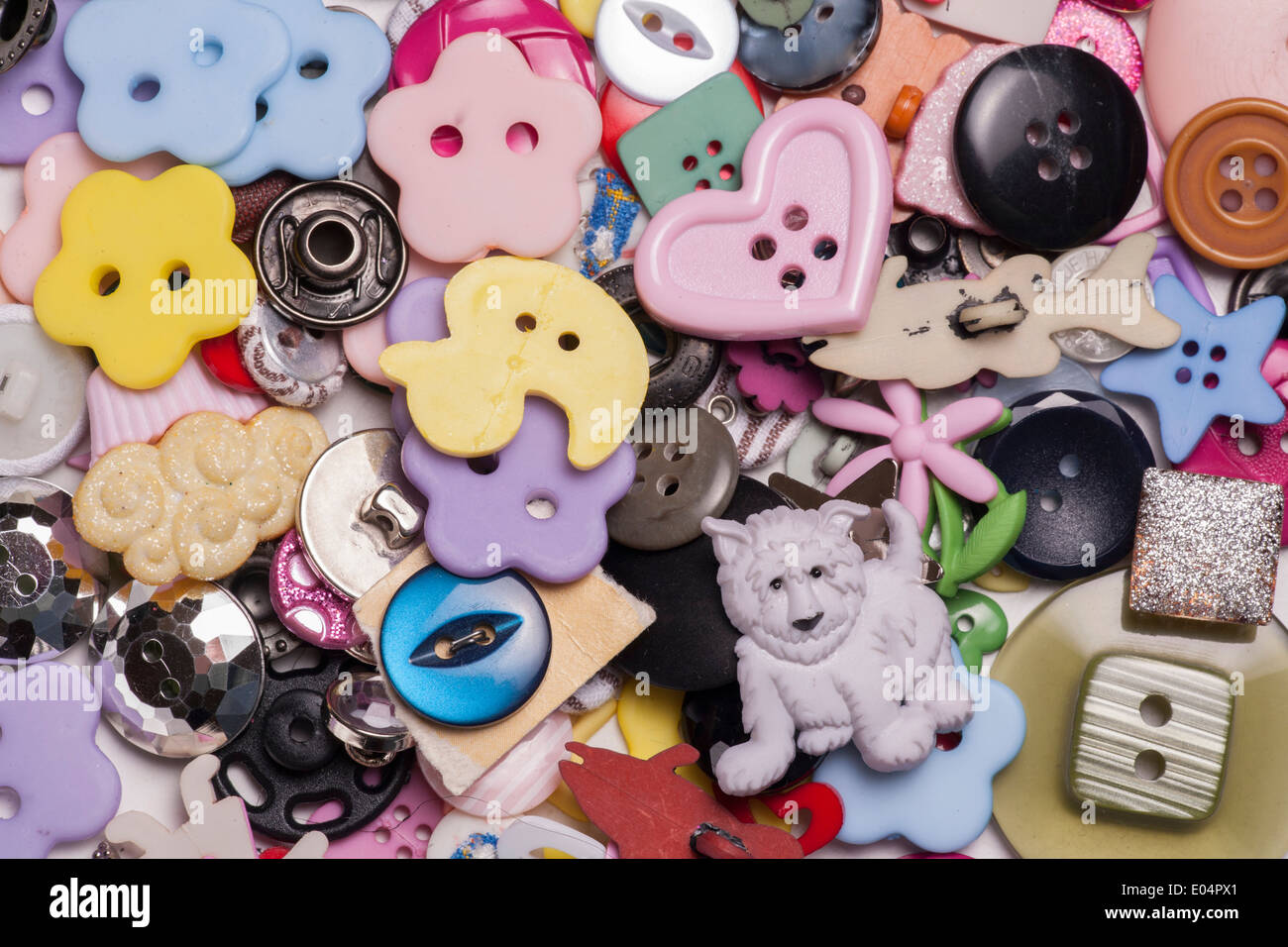 Pile of different buttons abstract Stock Photo - Alamy