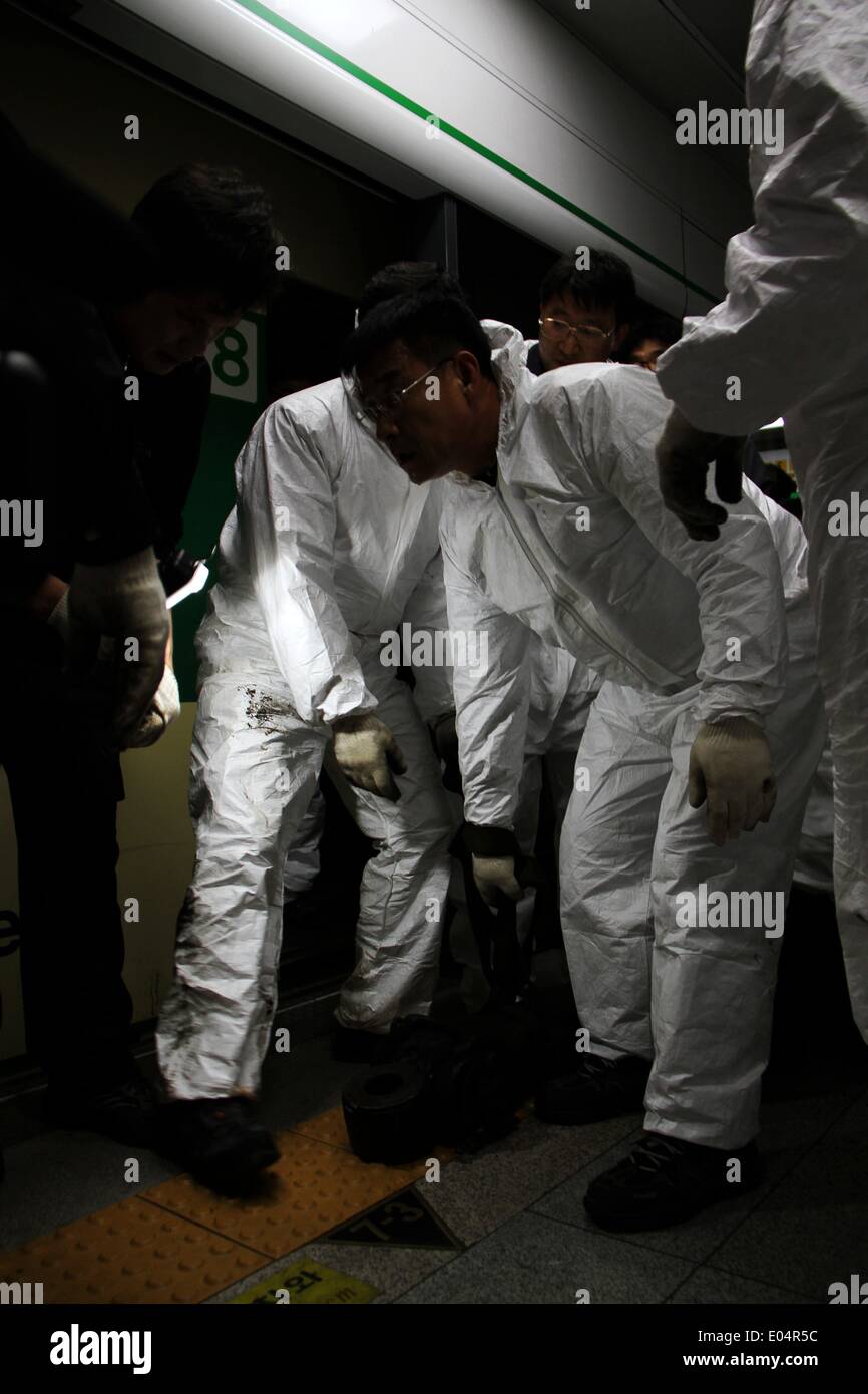 Seoul, South Korea. 2nd May, 2014. Mechanics work to restore the subway ...