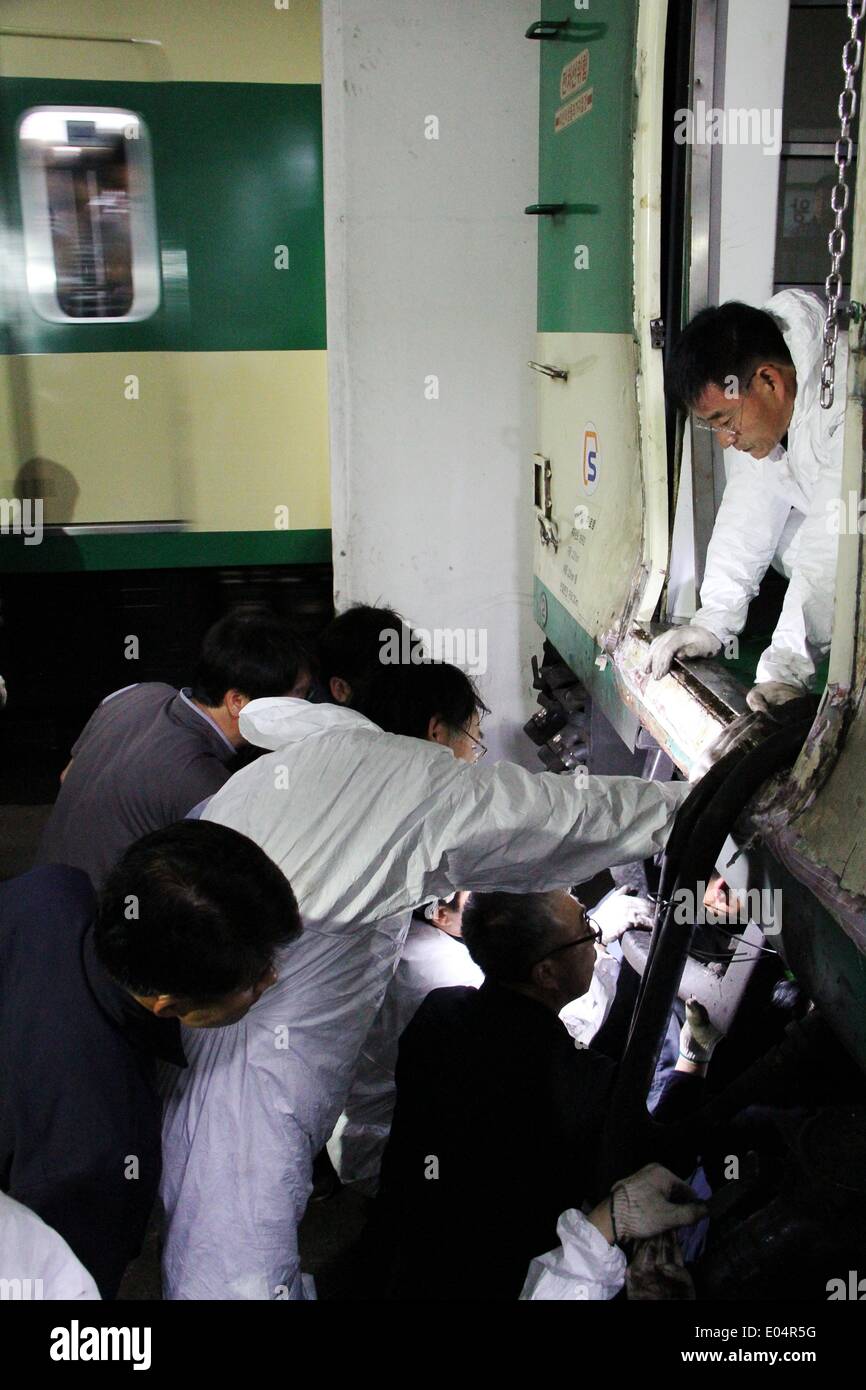 Seoul, South Korea. 2nd May, 2014. Mechanics work to restore the subway ...