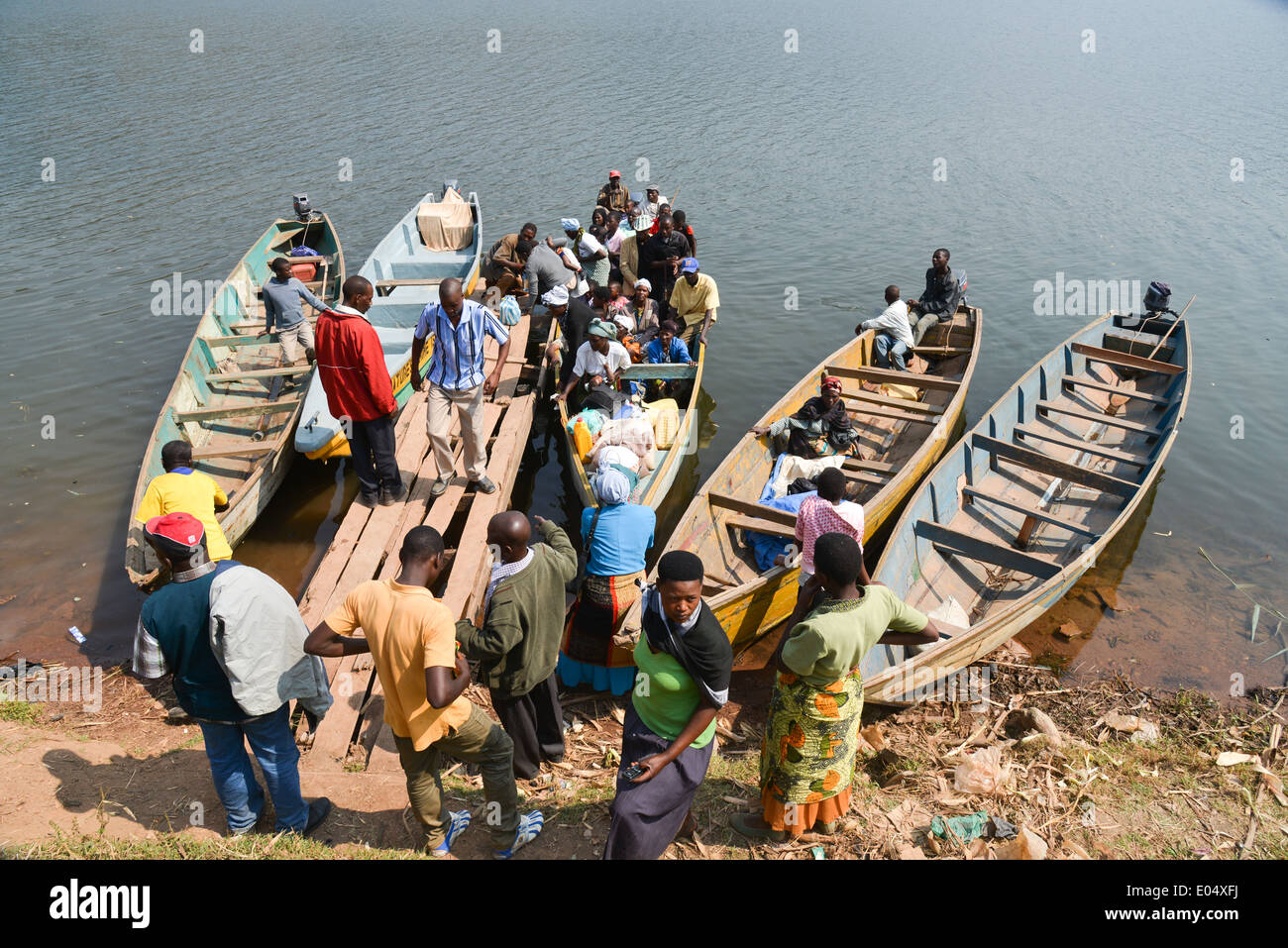 wooden canoes for transport to marketplace at crater lake bunyonyi in ...