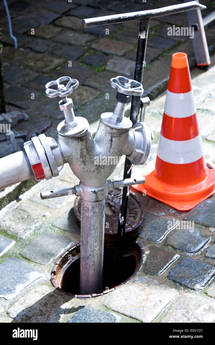Fire hydrant and water pipe Stock Photo - Alamy