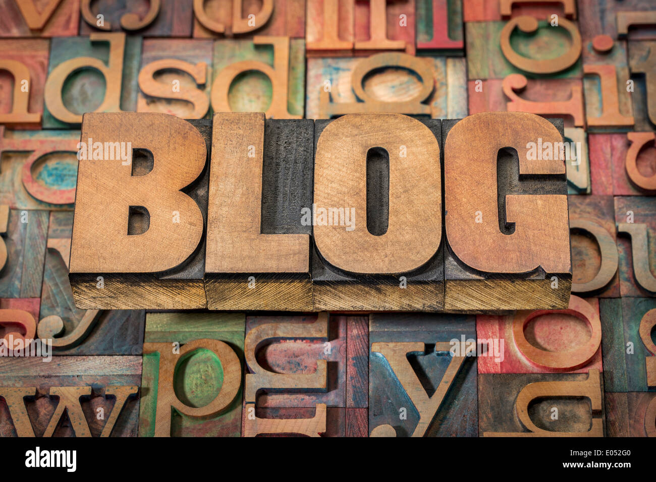 blog word in wood type against background of letterpress printing ...