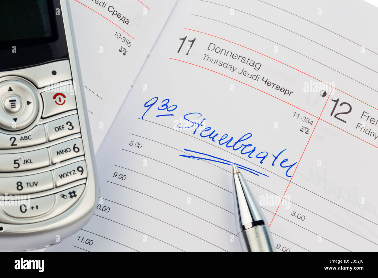 An appointment is put down in a calendar: Tax adviser, Ein Termin ist ...