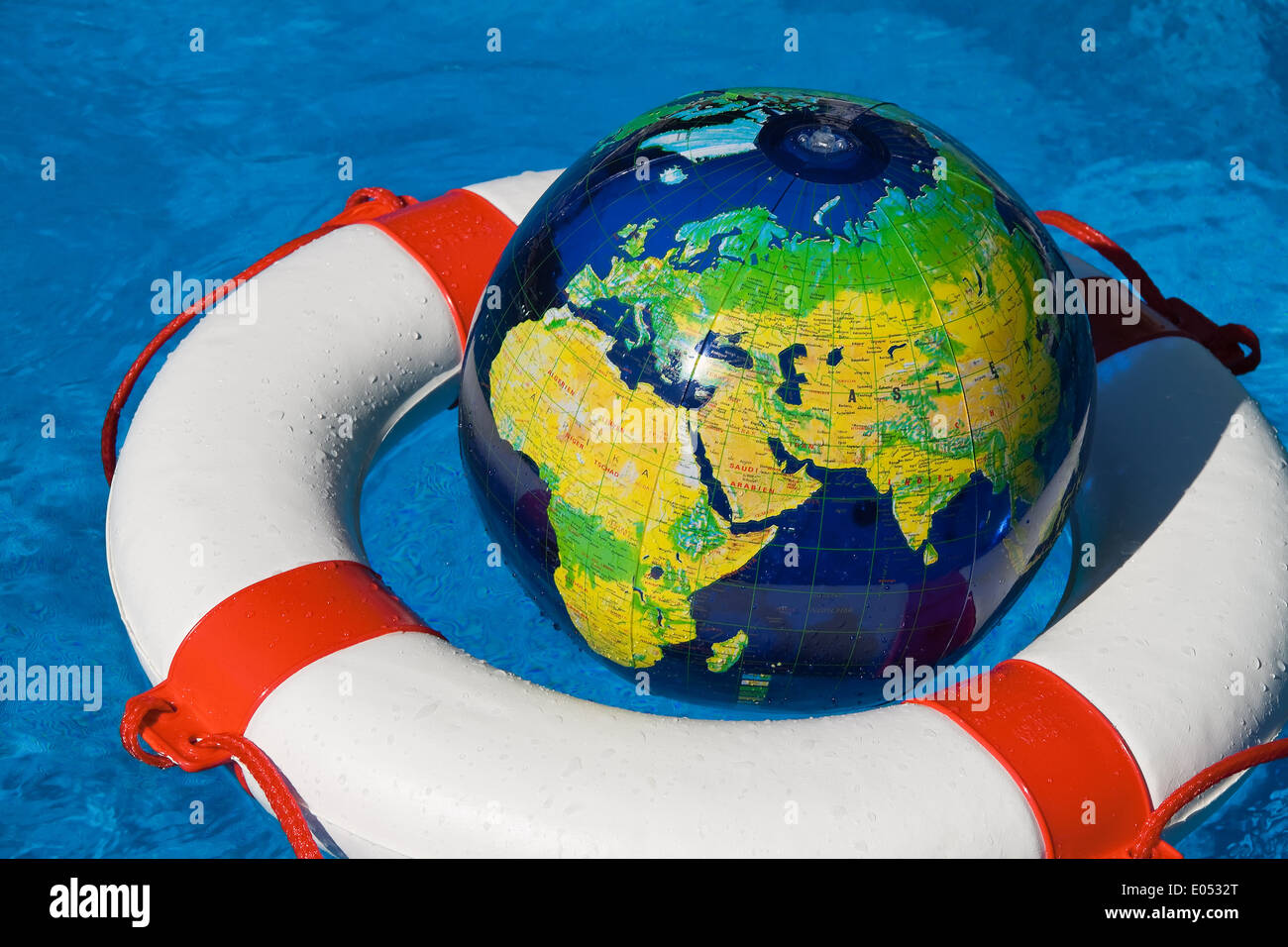 Life saver swims in swimming pool symbolic photo for help hi-res stock ...