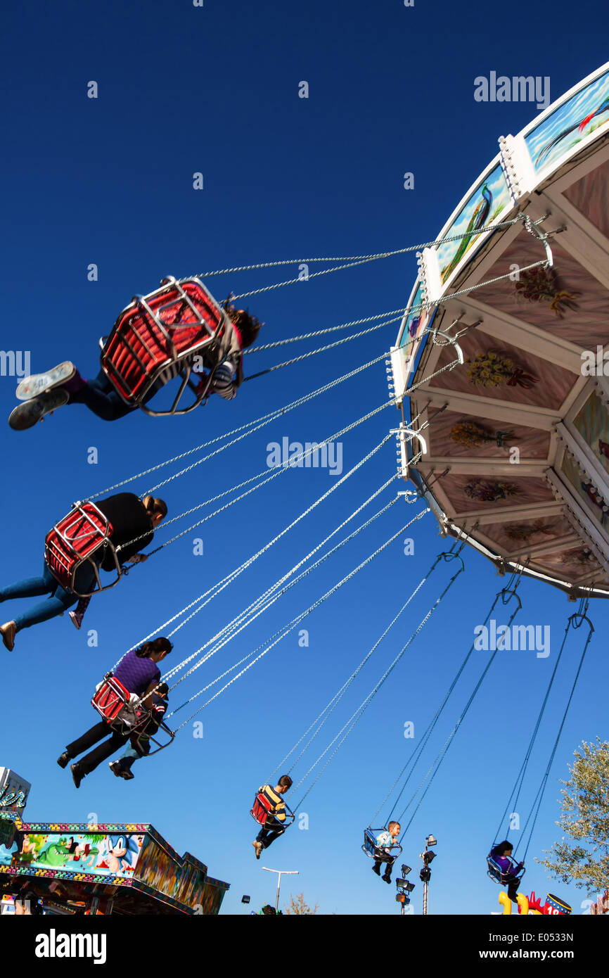 A carousel (roundabout) provides for good mood on a public festival ...
