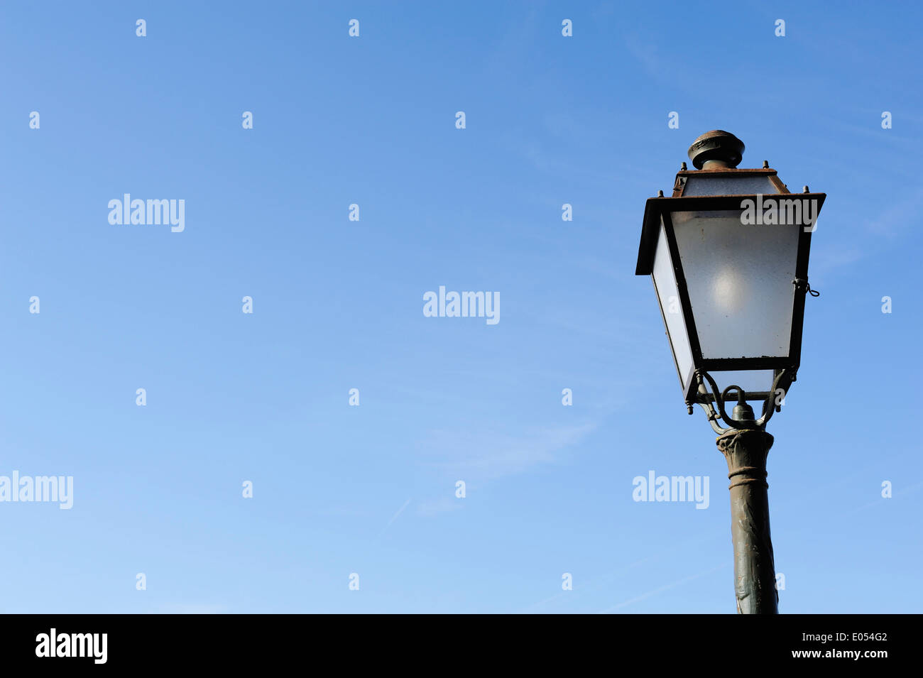 Stock photo of a french lampost against a blue sky Stock Photo - Alamy