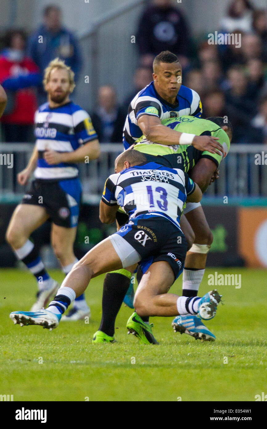 Bath, UK. 02nd May, 2014. Samu MANOA (Northampton Saints) is tackled by ...