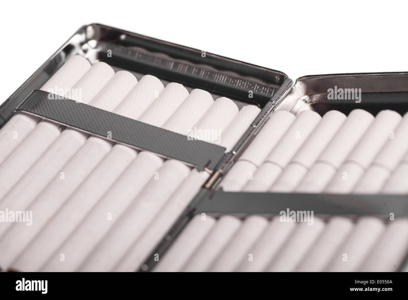 Color detail of a cigarette case with white cigarettes Stock Photo - Alamy