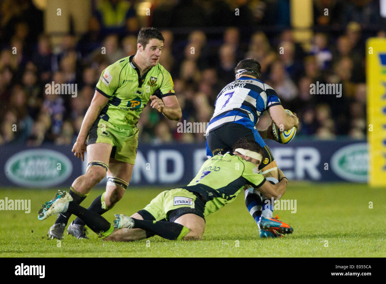 Bath, UK. 02nd May, 2014. Guy MERCER (Bath Rugby) is tackled by Tom ...