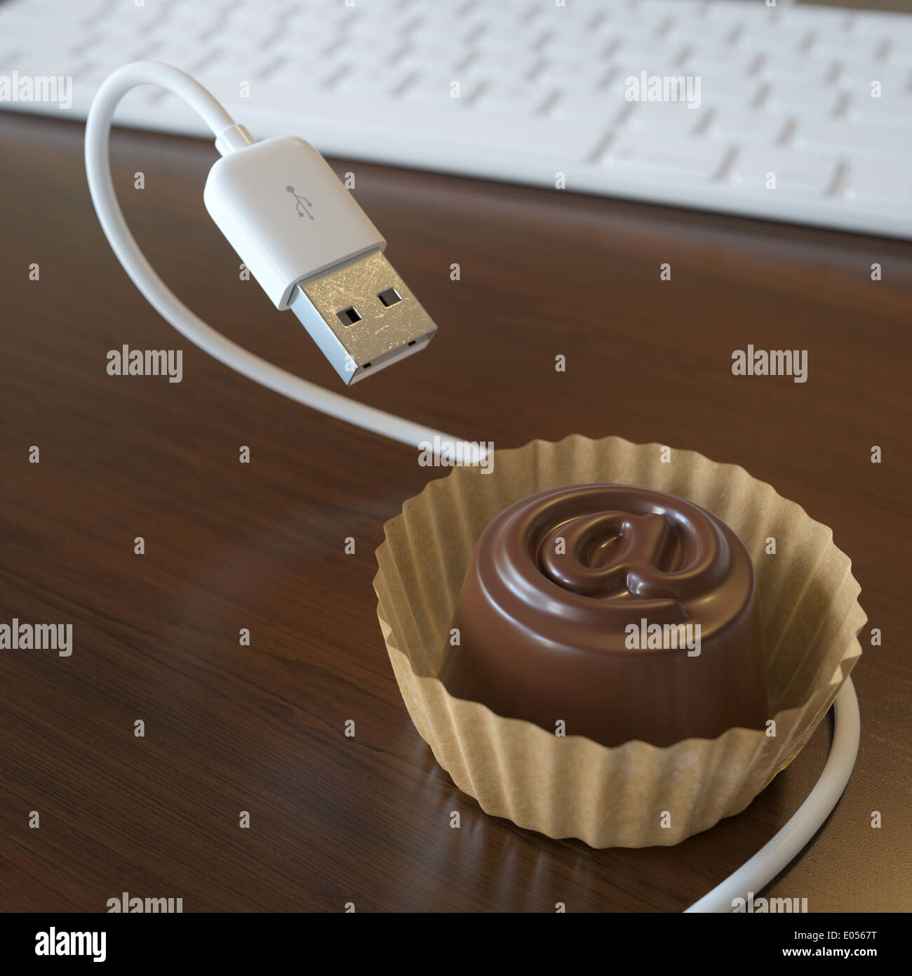 Conceptual Picture With Candy And USB Cable Stock Photo - Alamy