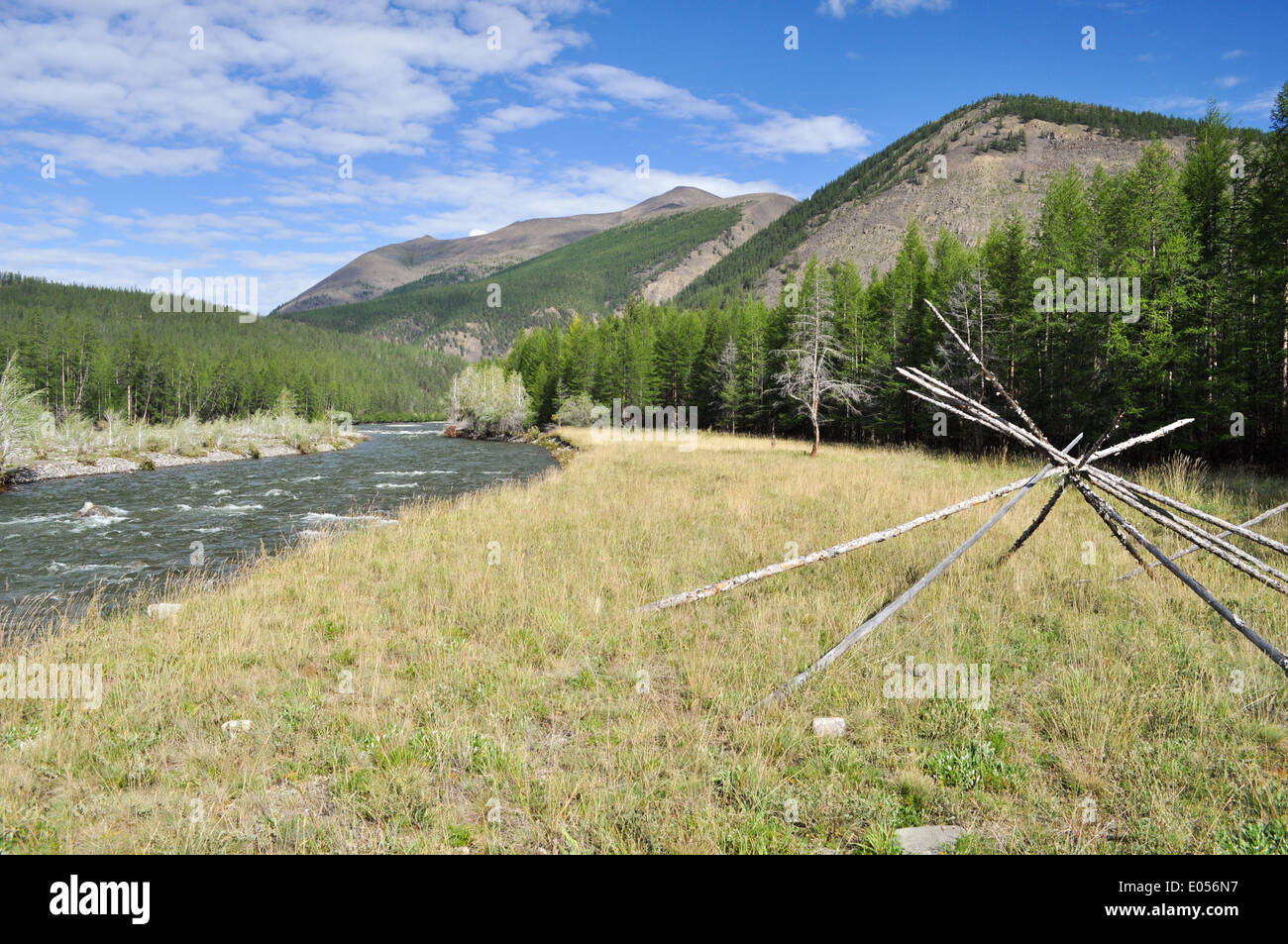 River flowing in a mountain valley. Landscape wildlife. Russia, Yakutia ...