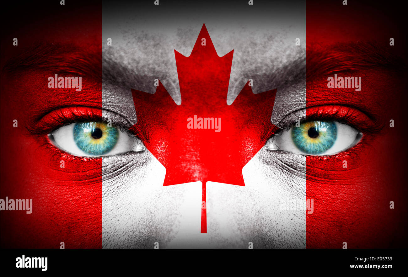 Human face painted with flag of Canada Stock Photo - Alamy