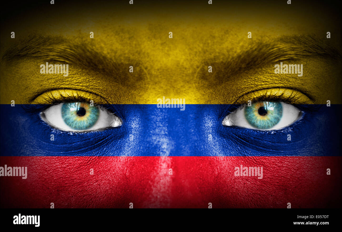 Human face painted with flag of Colombia Stock Photo - Alamy