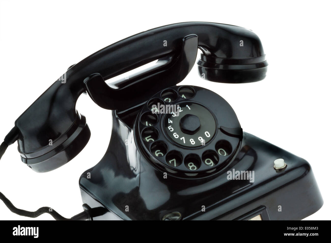 An antique, old fixed network telephone. Phone on white background ...