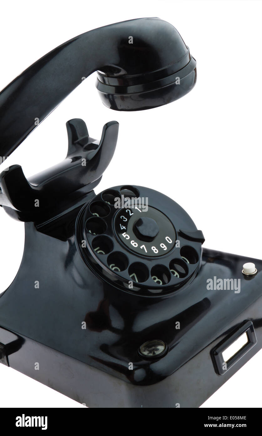 An antique, old fixed network telephone. Phone on white background ...