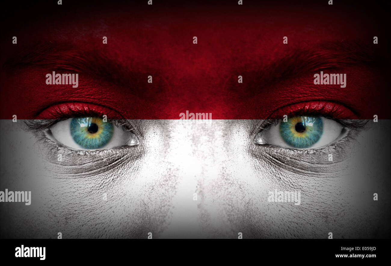 Human face painted with flag of Monaco Stock Photo - Alamy