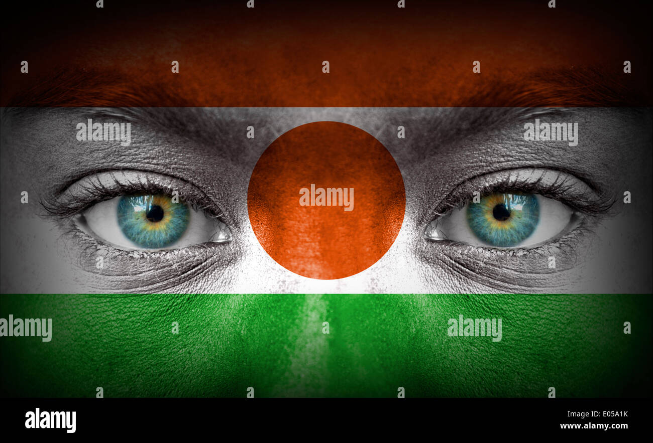Human face painted with flag of Niger Stock Photo - Alamy
