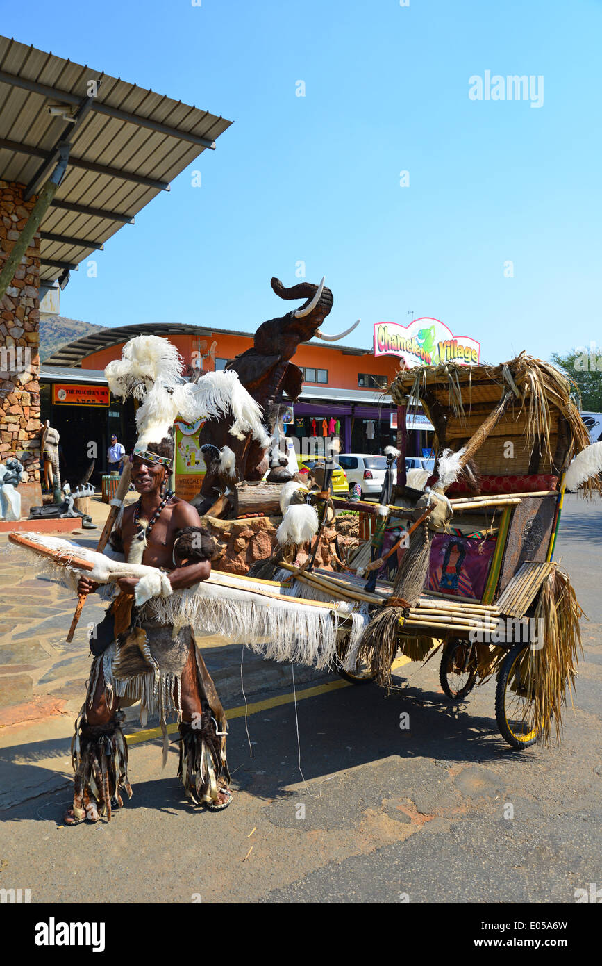 Zulu warrior with rickshaw at Chameleon Village, Hartbeespoort, North ...