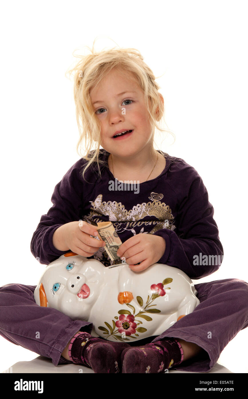 Kind mit geld hi-res stock photography and images - Alamy