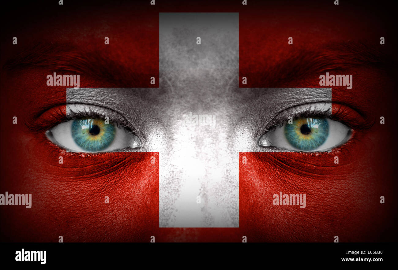 Human face painted with flag of Switzerland Stock Photo - Alamy