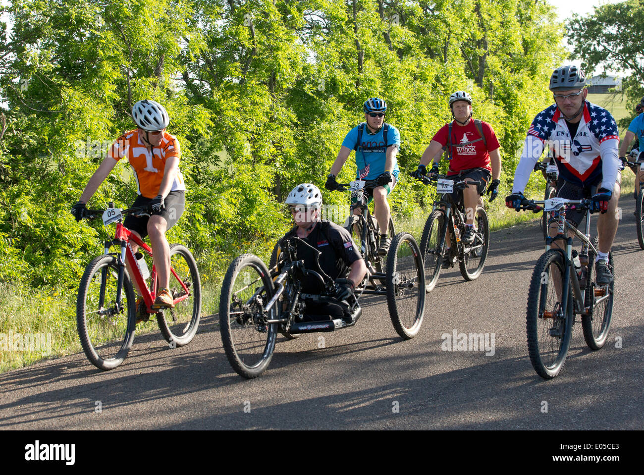 Timothy Brown hand cycles the course at former Pres. George W. Bush's ...