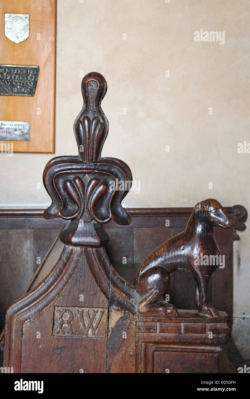 A view of a medieval bench end in the parish church of St Andrew at ...
