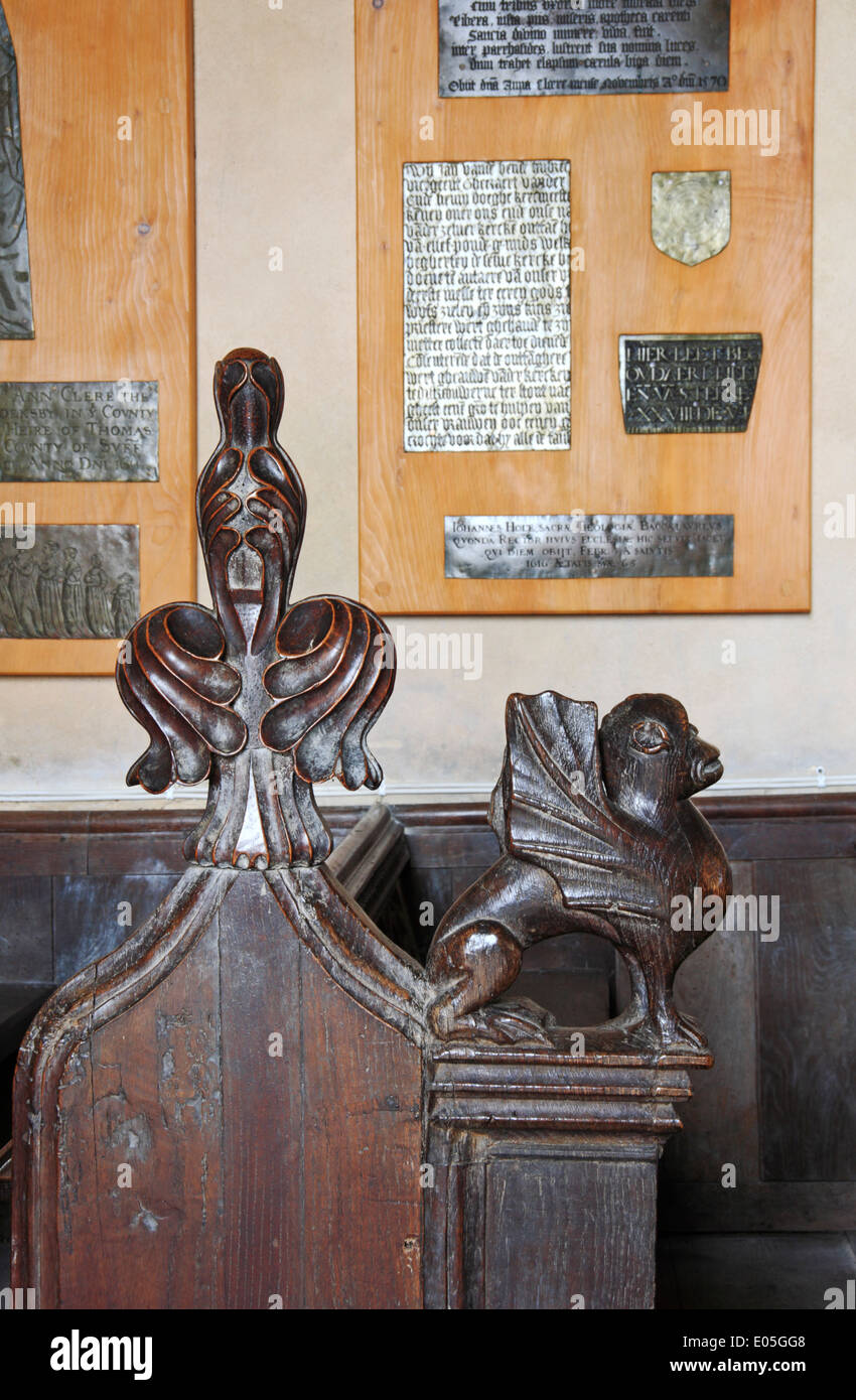 A view of a medieval bench end in the parish church of St Andrew at ...