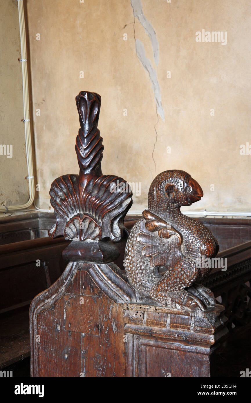 A view of a medieval bench end in the parish church of St Andrew at ...