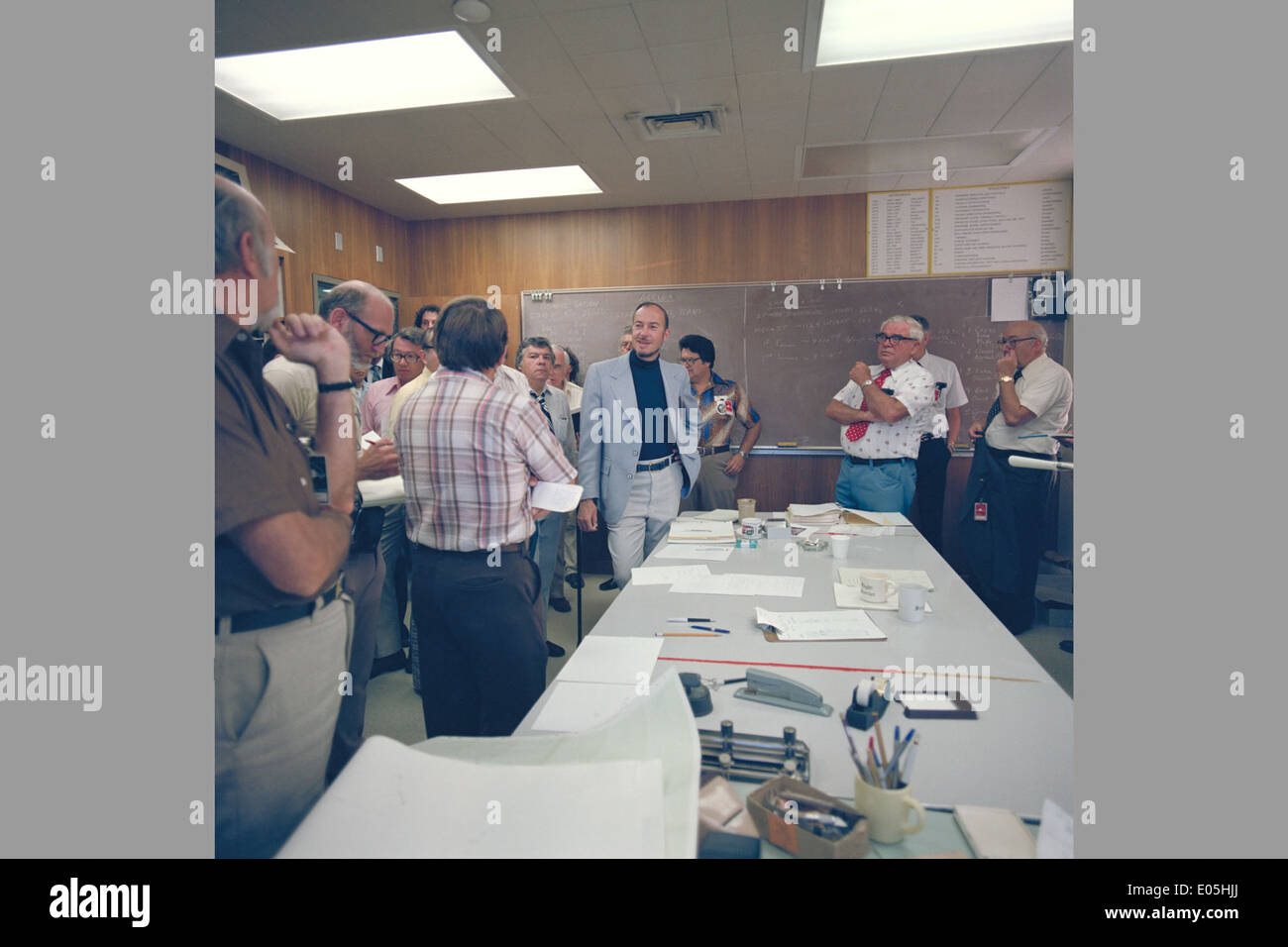 The Pioneer Saturn project manager conducts a daily stand-up meeting to ...