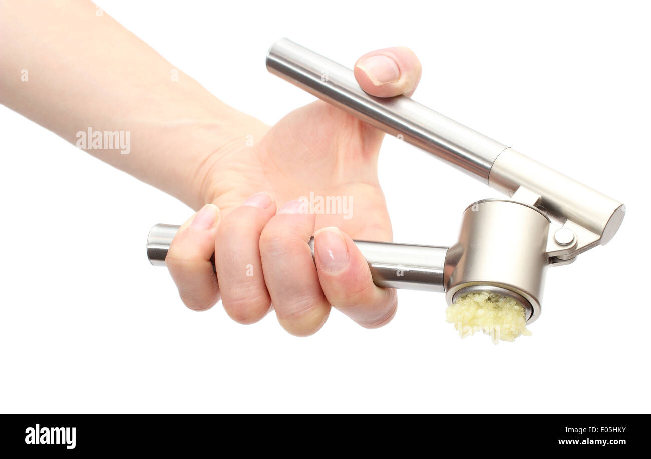 Hand using garlic press hi-res stock photography and images - Alamy