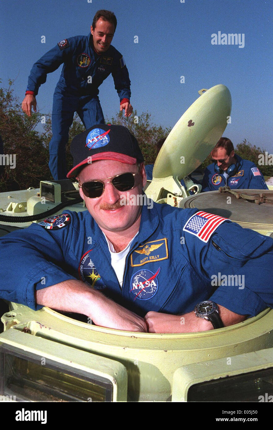 STS-103 Pilot Scott J. Kelly operates a small armored personnel carrier ...