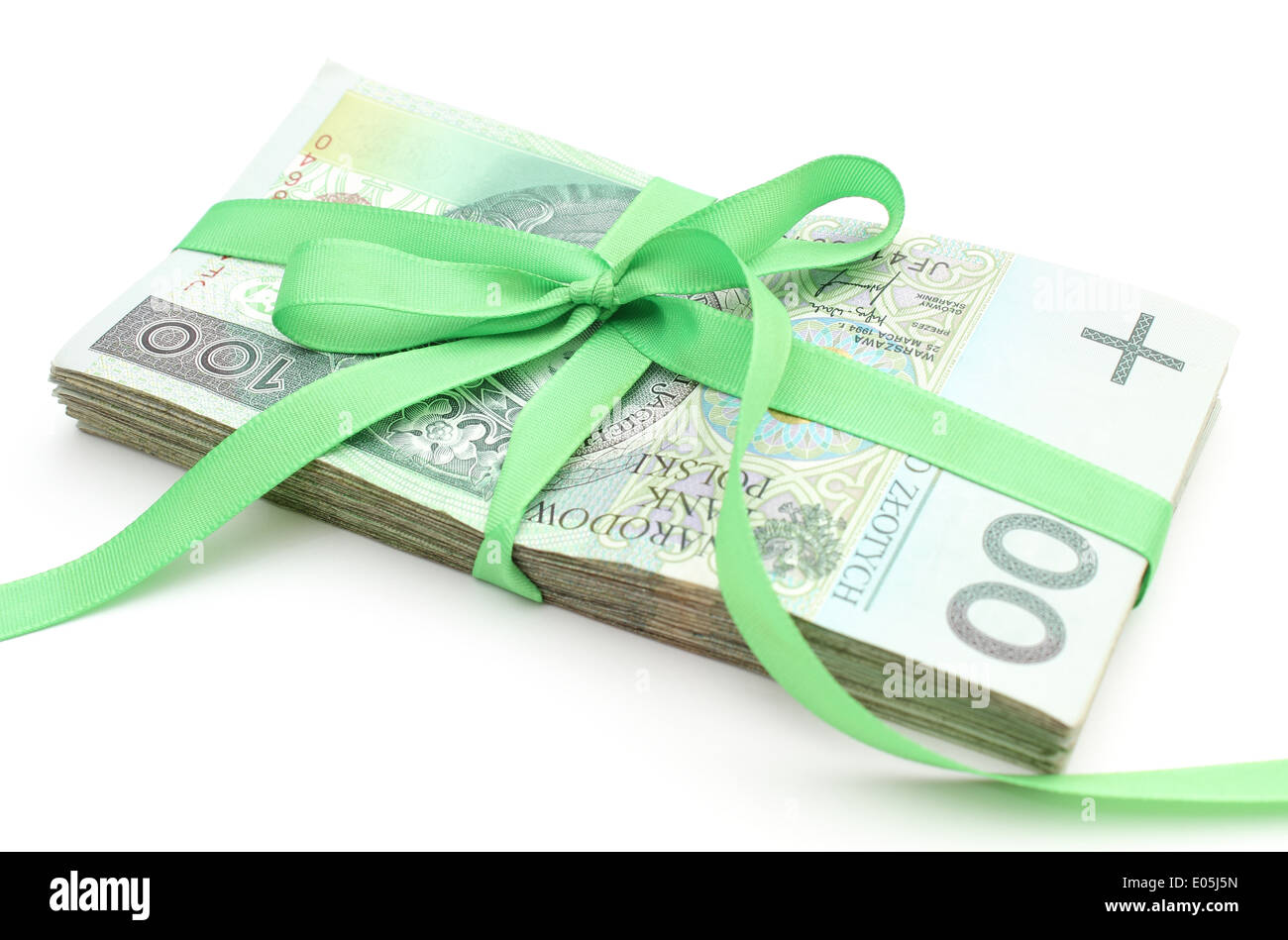 Pile of banknotes tied green ribbon for gift, isolated on white ...