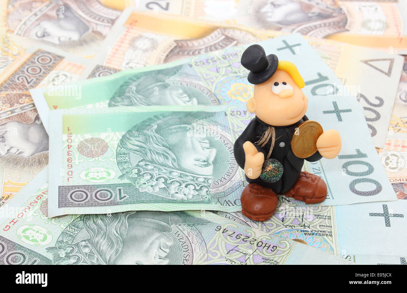 Chimney sweep with coin standing on a stack of money. Isolated on white ...