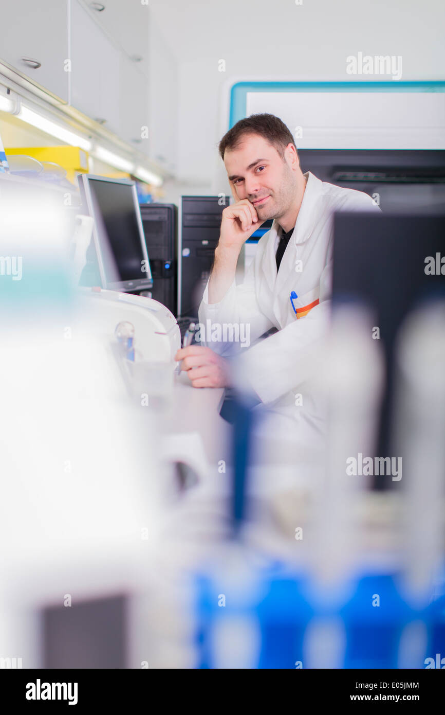 Young man in the medical laboratory Stock Photo - Alamy